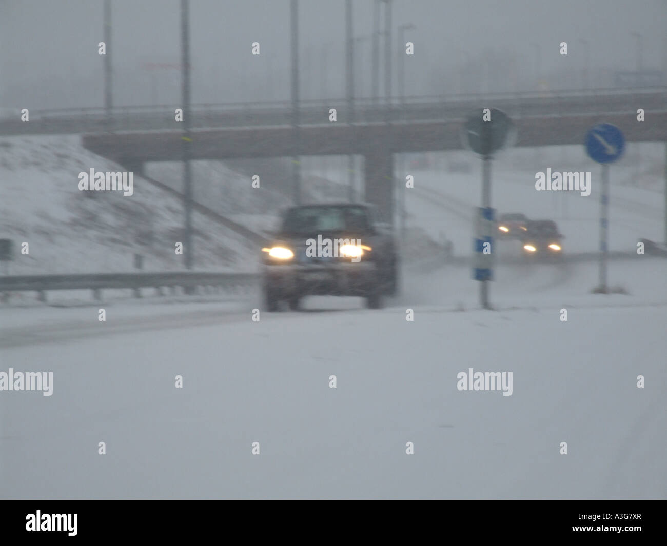 one car driving in heavy snow in sweden Stock Photo - Alamy