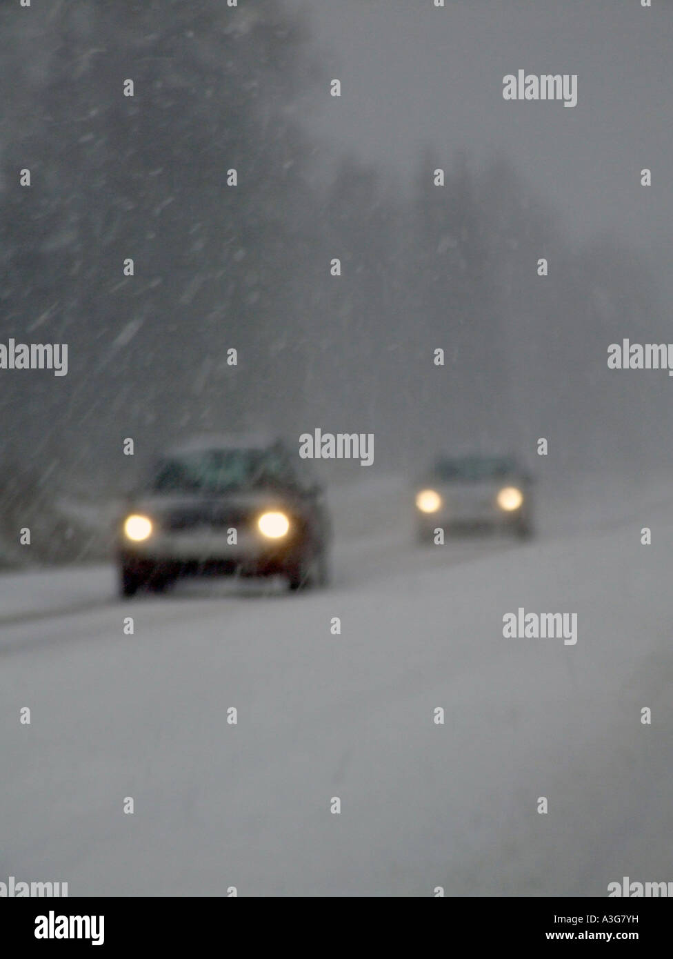 two cars driving in heavy snow in sweden Stock Photo - Alamy