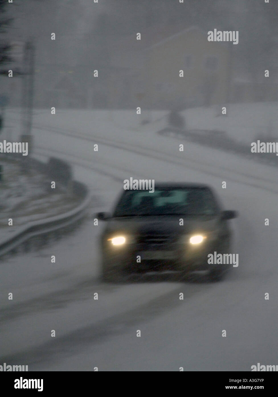 one car driving in heavy snow in sweden Stock Photo - Alamy