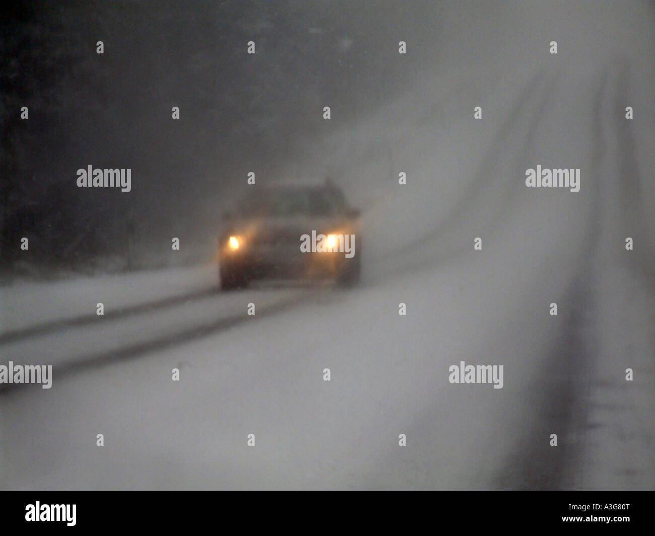 one car driving in heavy snow in sweden Stock Photo - Alamy