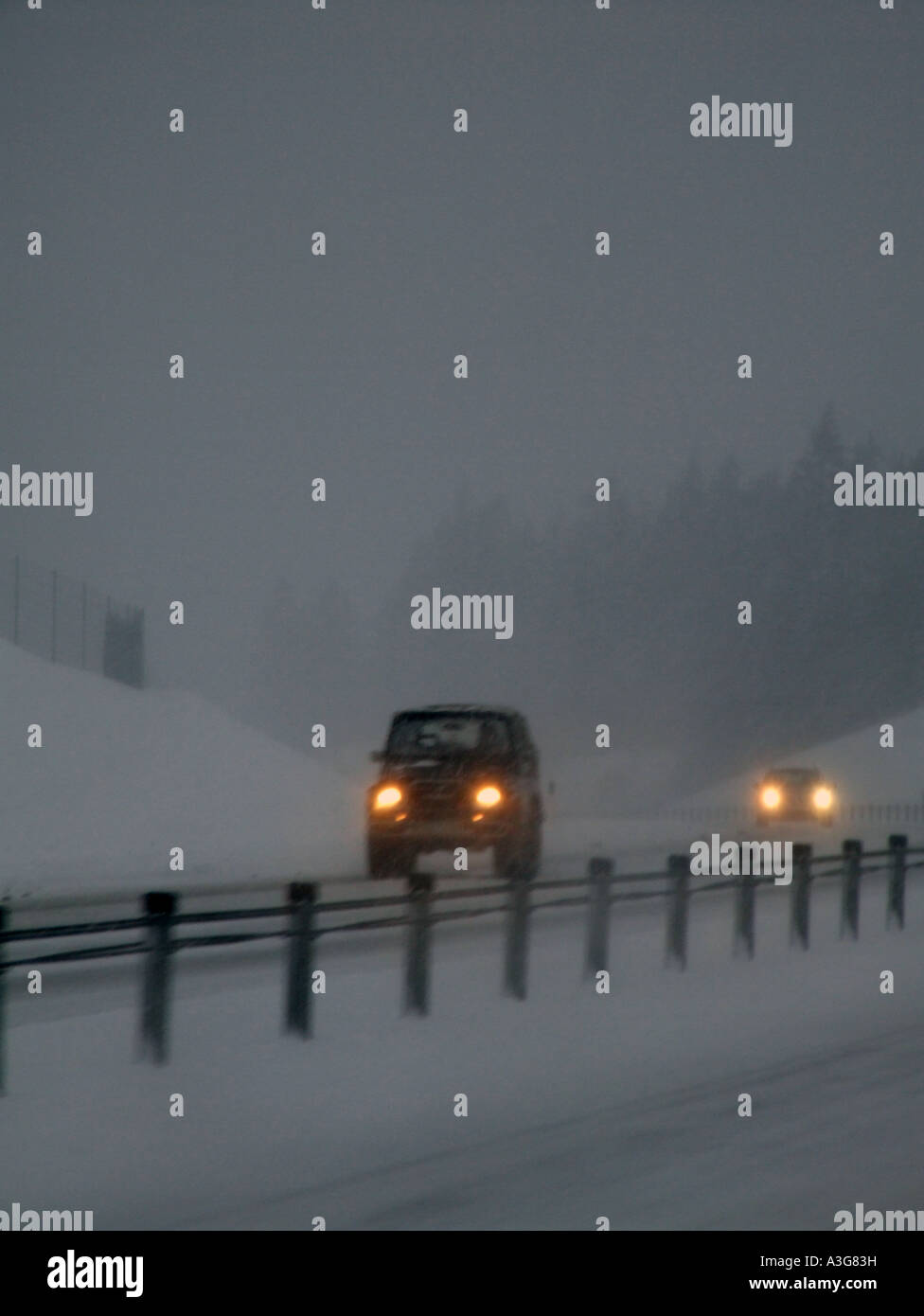 two cars driving in heavy snow in sweden Stock Photo - Alamy