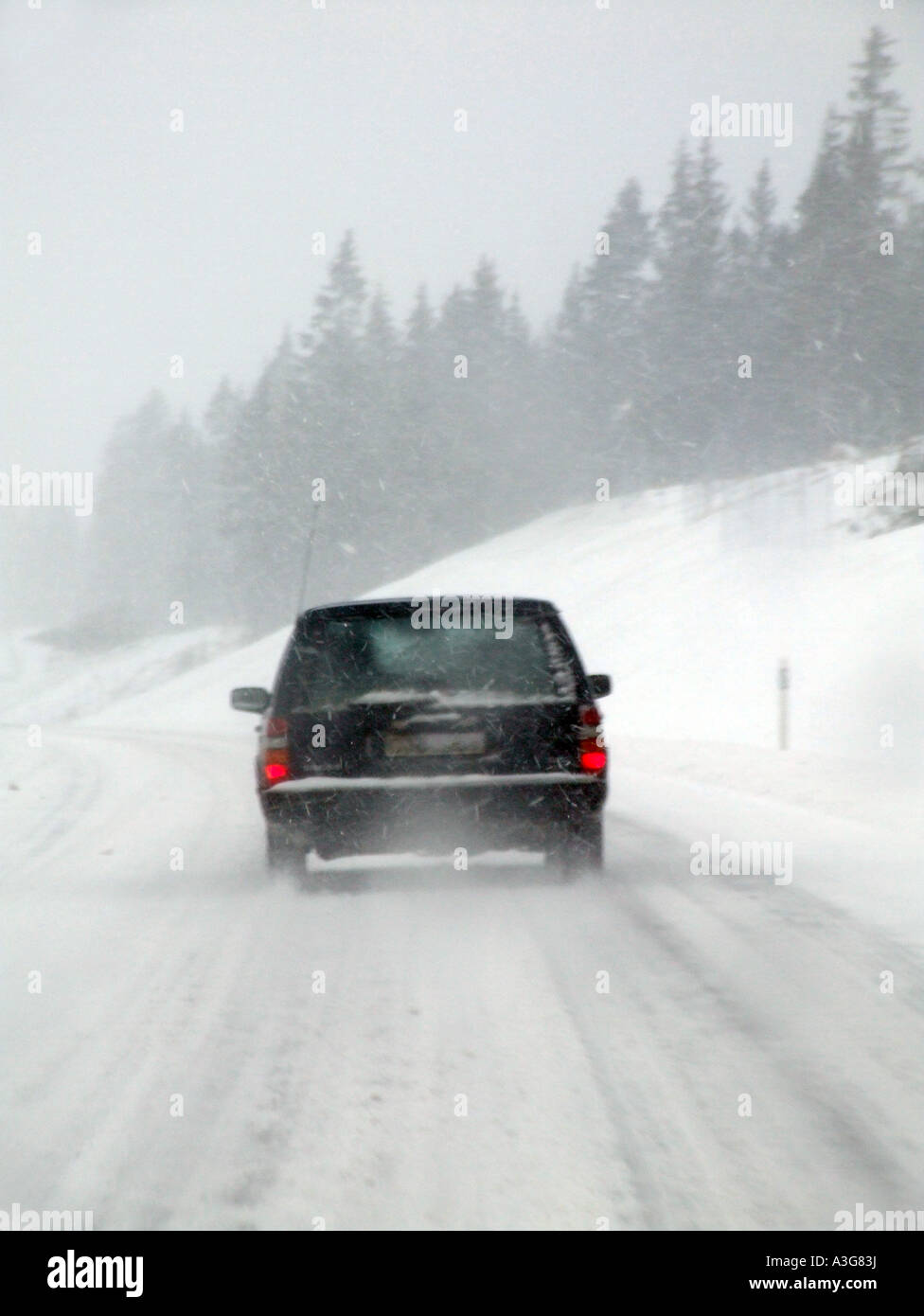 one volvo car driving in heavy snow in sweden Stock Photo - Alamy