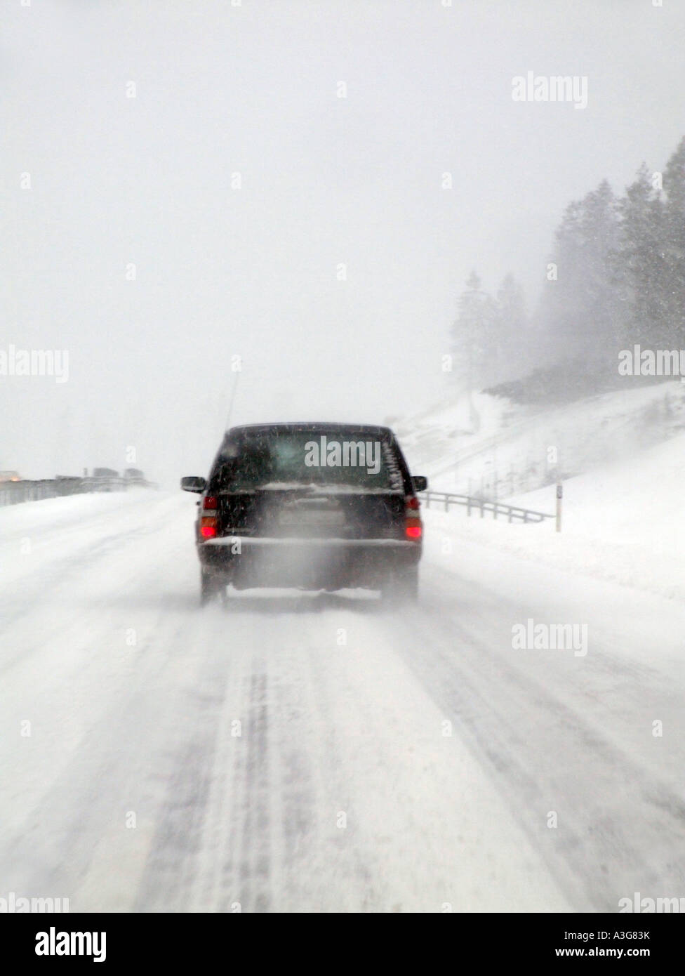 one volvo car driving in heavy snow in sweden Stock Photo - Alamy