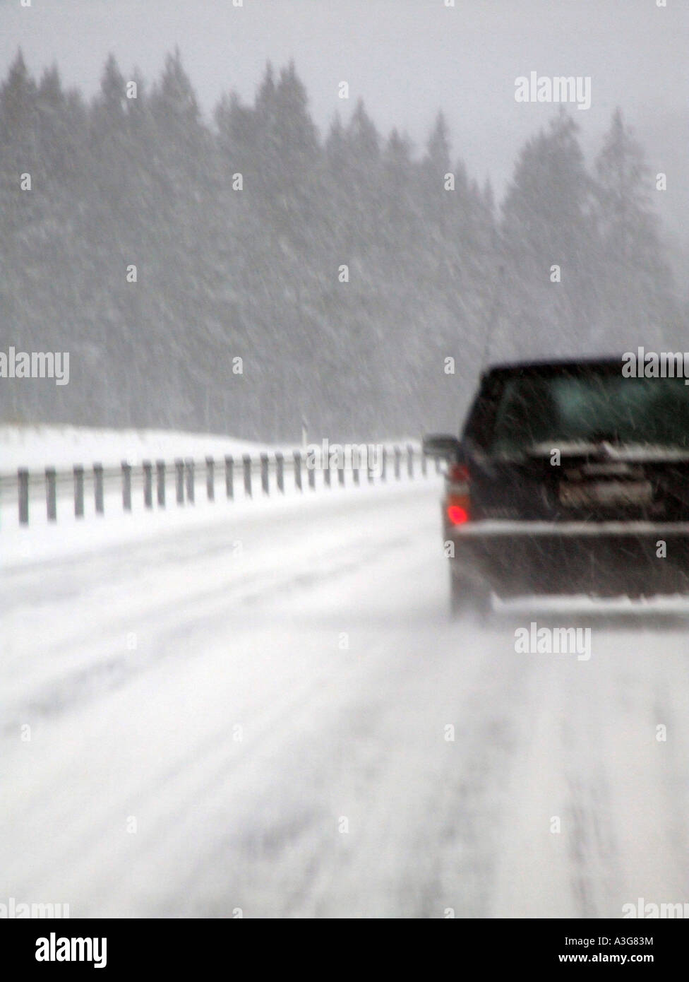 one volvo car driving in heavy snow in sweden Stock Photo - Alamy