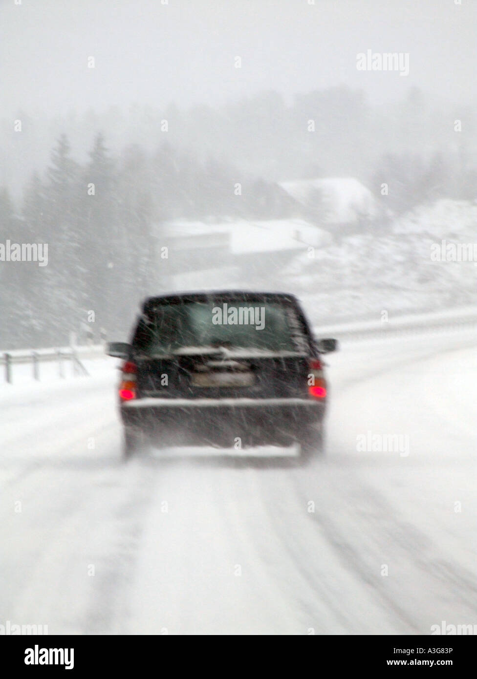 one volvo car driving in heavy snow in sweden Stock Photo - Alamy