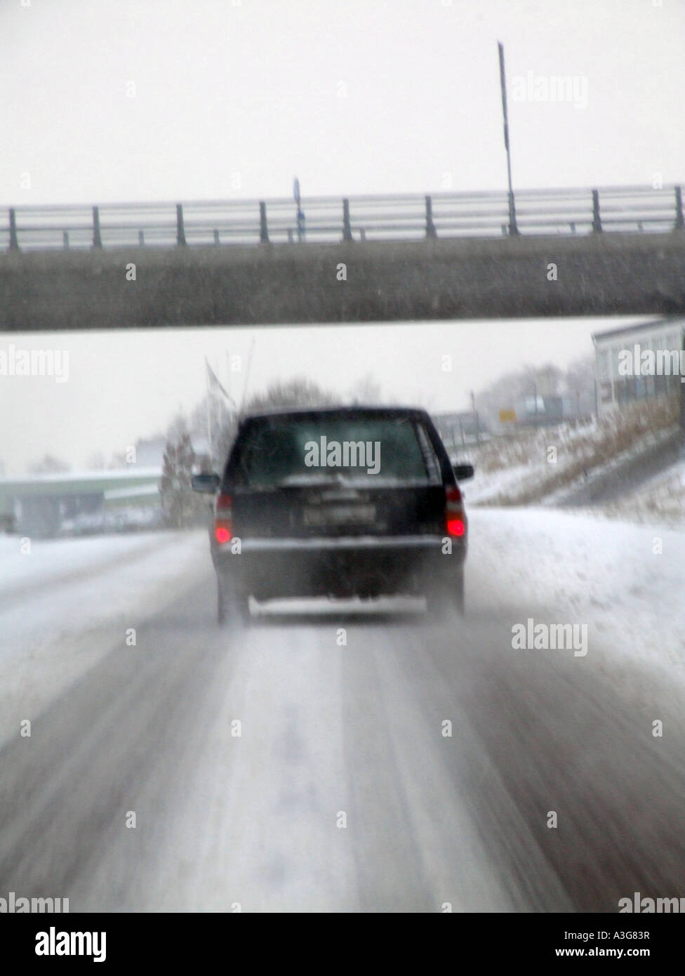 one volvo car driving in heavy snow in sweden Stock Photo - Alamy