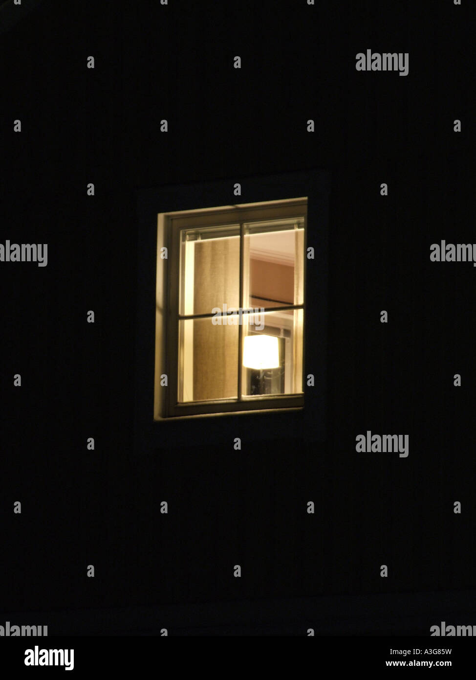 lantern in window at night in sweden Stock Photo - Alamy