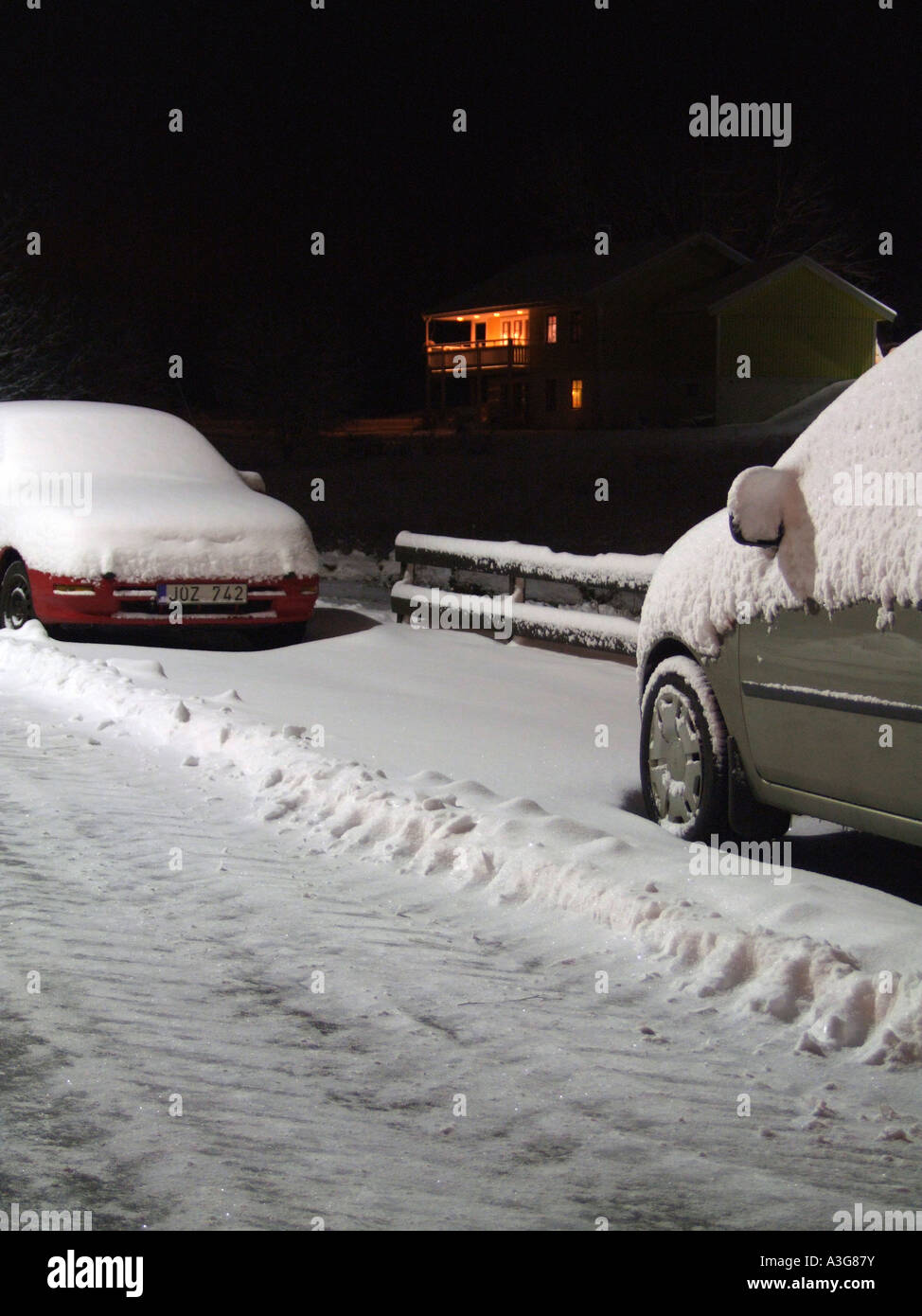 snow bound cars at night Stock Photo - Alamy
