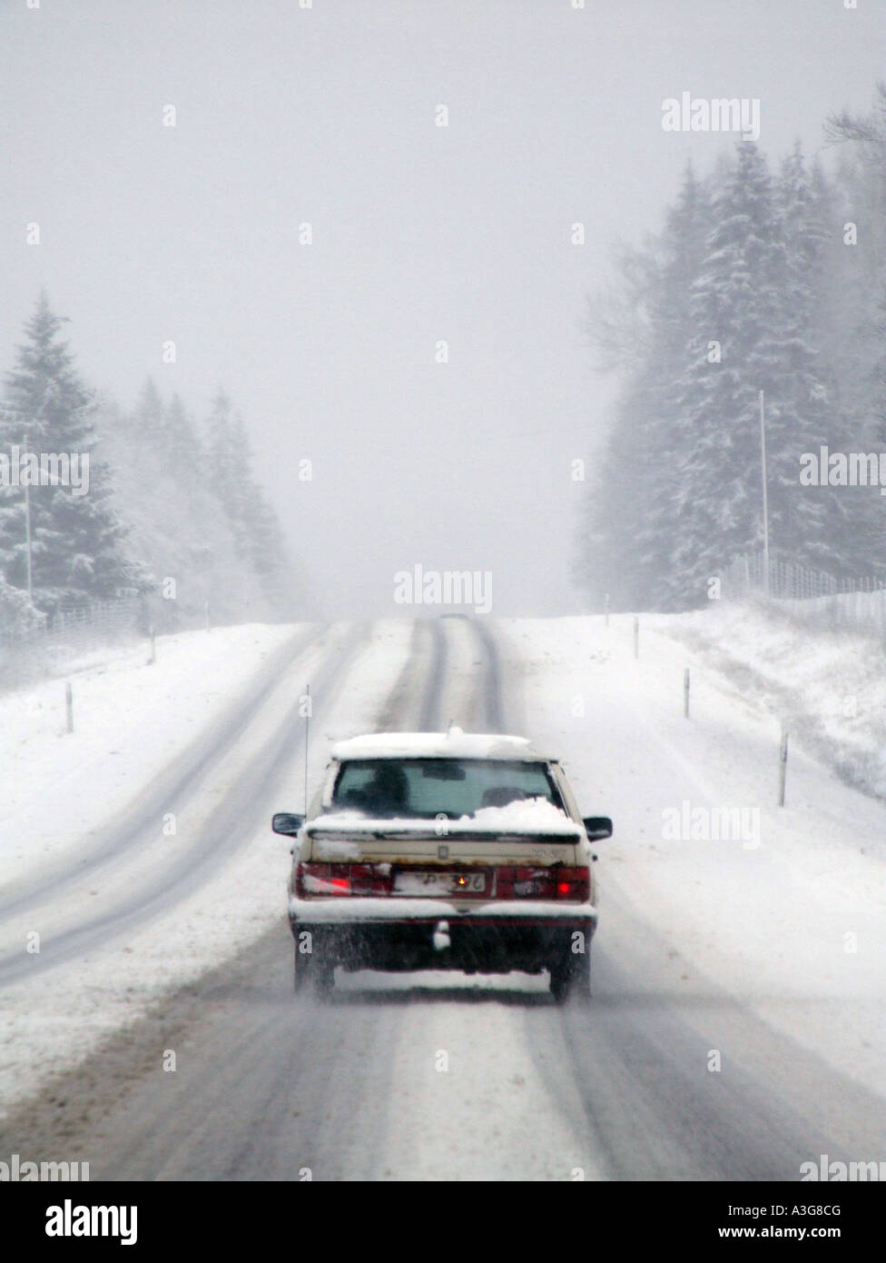 one volvo car driving in heavy snow in sweden Stock Photo - Alamy