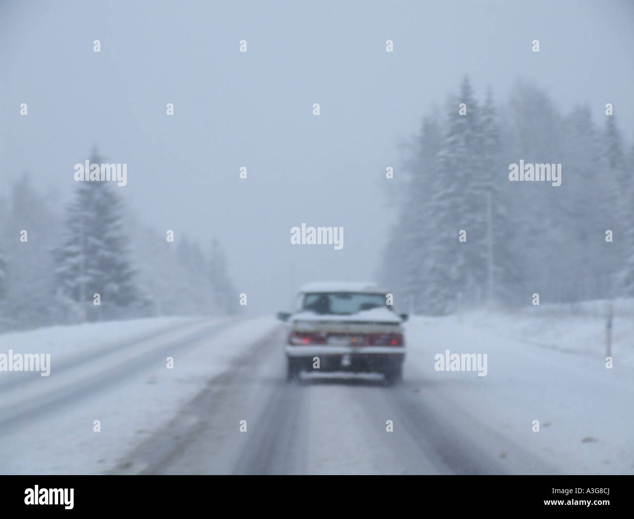 one volvo car driving in heavy snow in sweden Stock Photo - Alamy