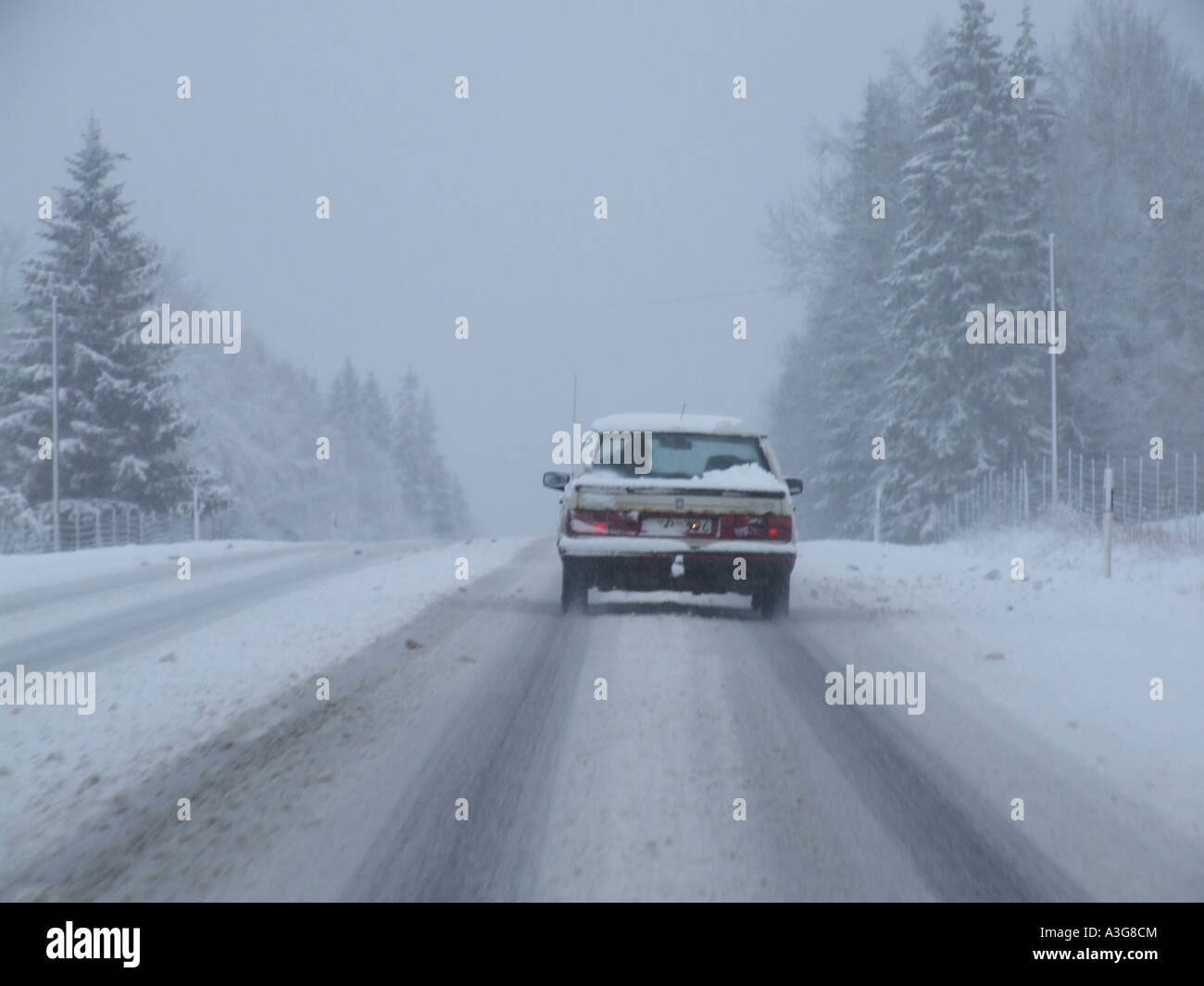 one volvo car driving in heavy snow in sweden Stock Photo - Alamy