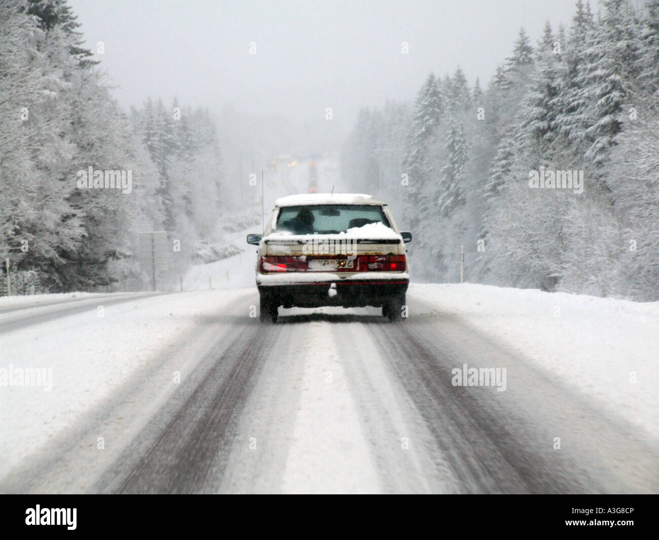one volvo car driving in heavy snow in sweden Stock Photo - Alamy