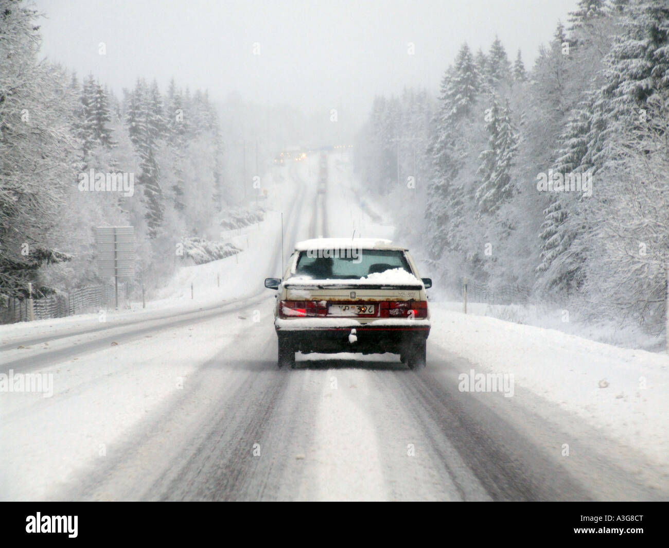 one volvo car driving in heavy snow in sweden Stock Photo - Alamy