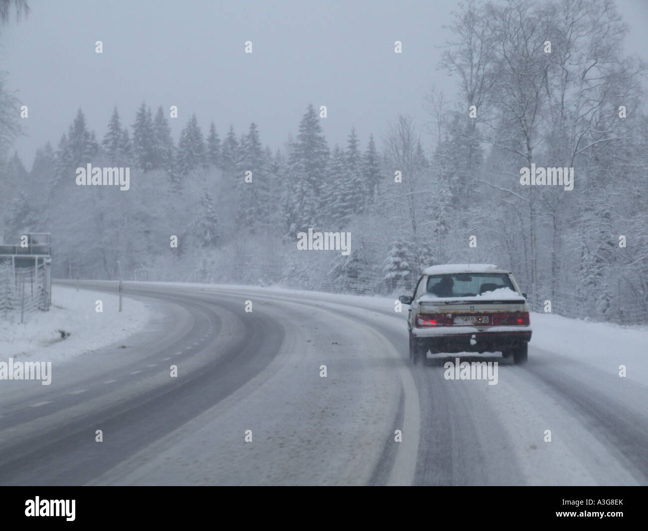 one car driving in heavy snow Stock Photo - Alamy