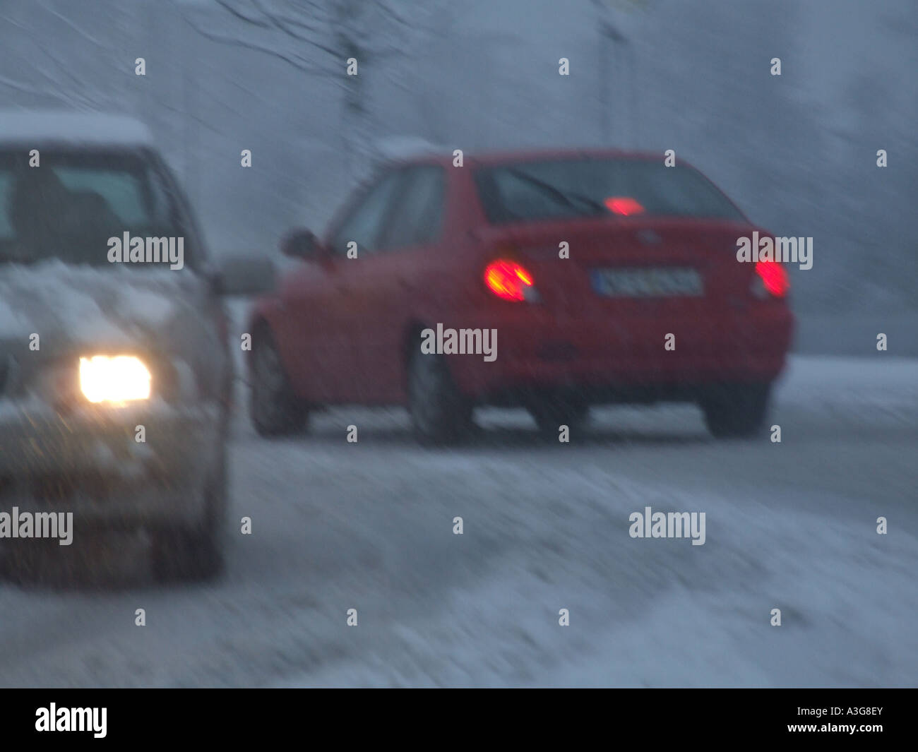two cars driving in heavy snow in sweden Stock Photo - Alamy