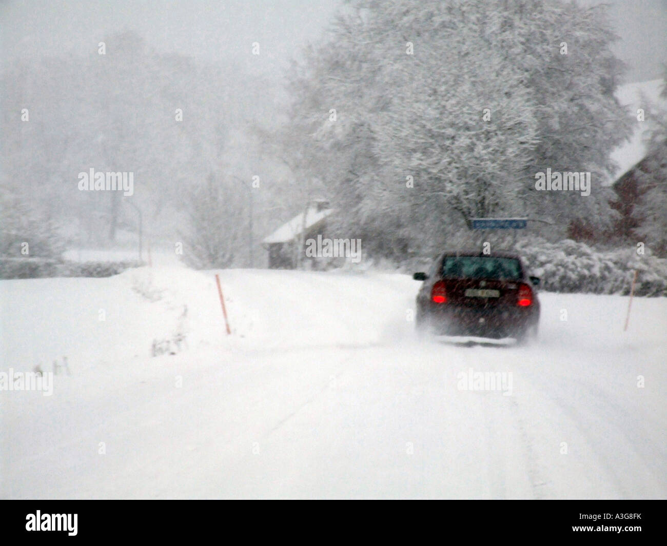 car driving in heavy snow in sweden Stock Photo - Alamy
