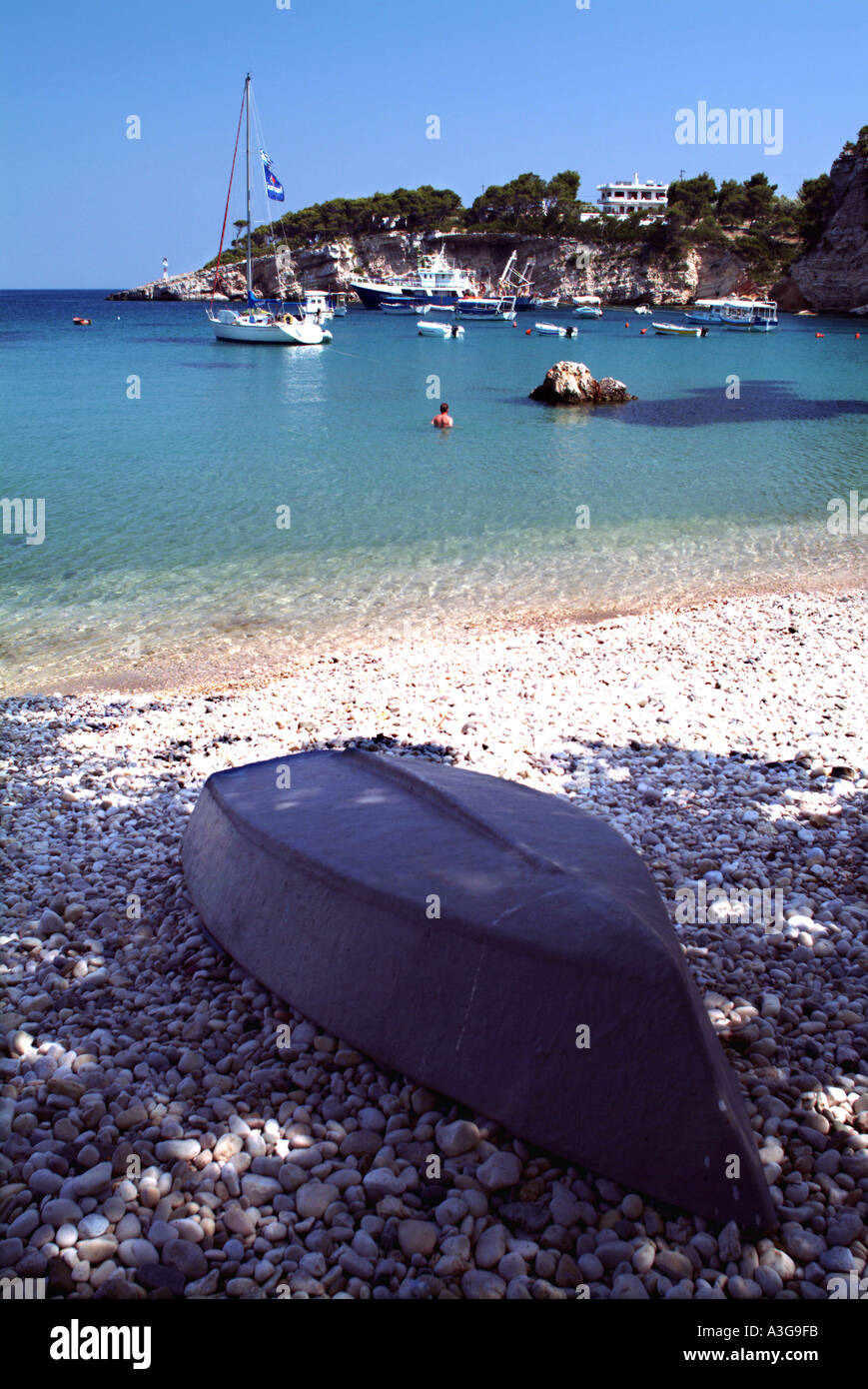 Up turned boat Patitiri beach Alonissos island Greece Stock Photo - Alamy