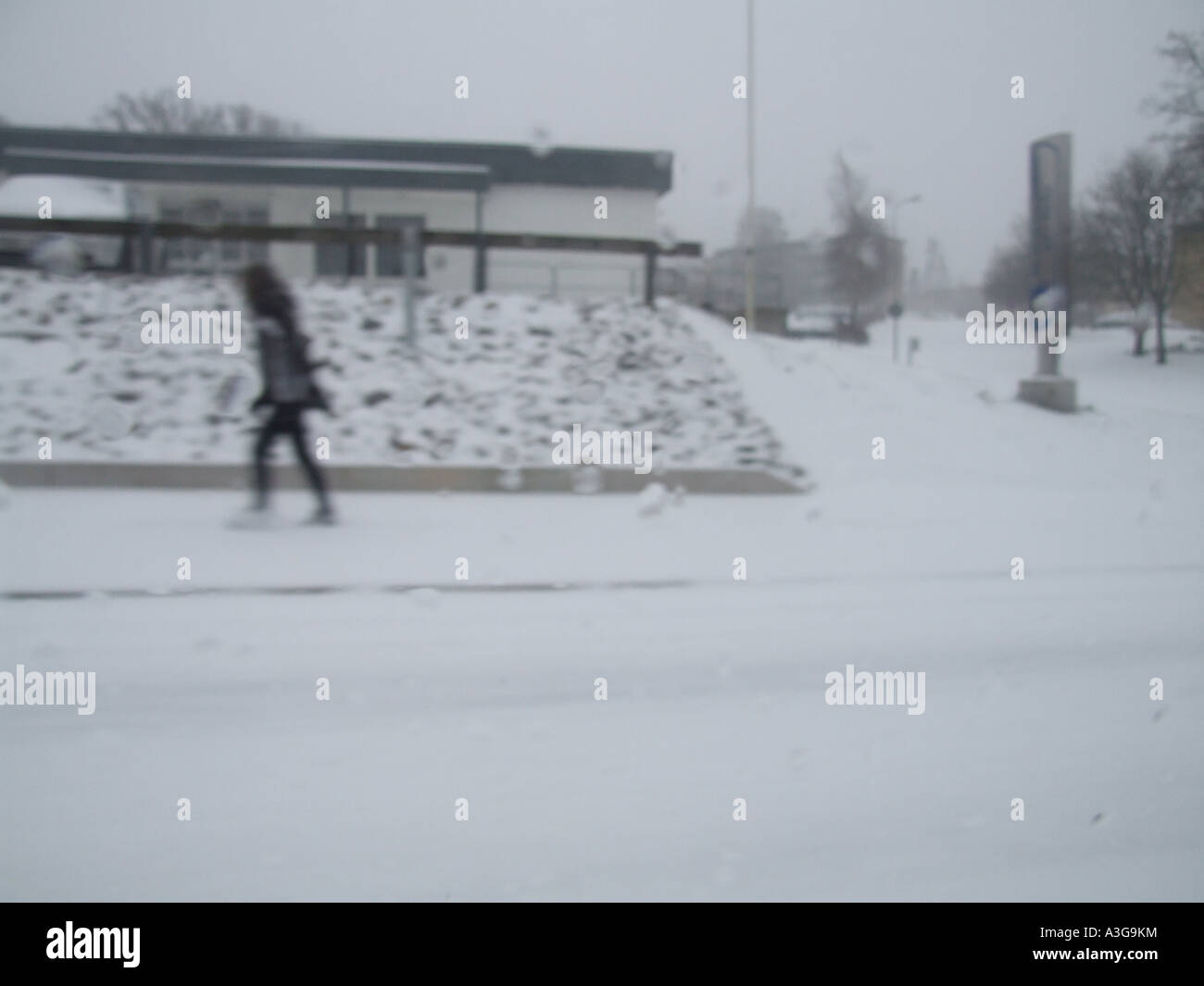person walking in snow Stock Photo - Alamy
