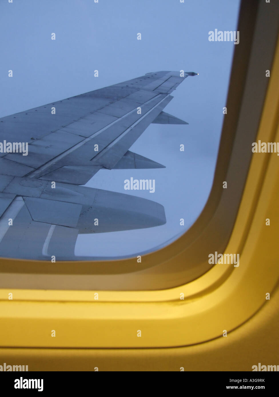 view of one old dirty plane wing from passenger window Stock Photo - Alamy