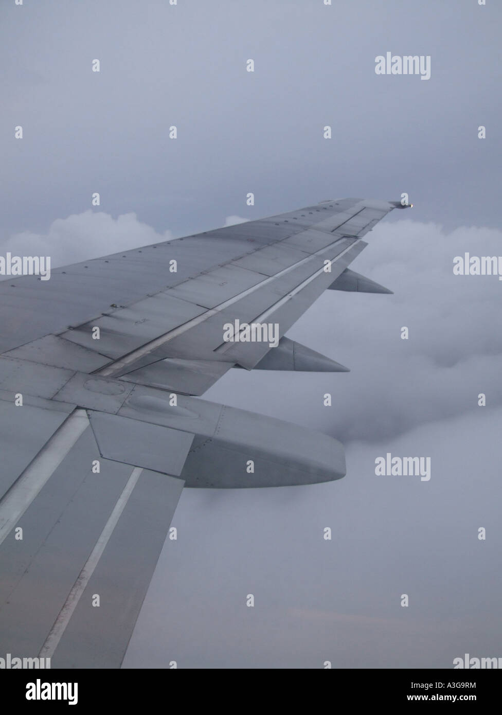 view of one old dirty plane wing from passenger window Stock Photo - Alamy