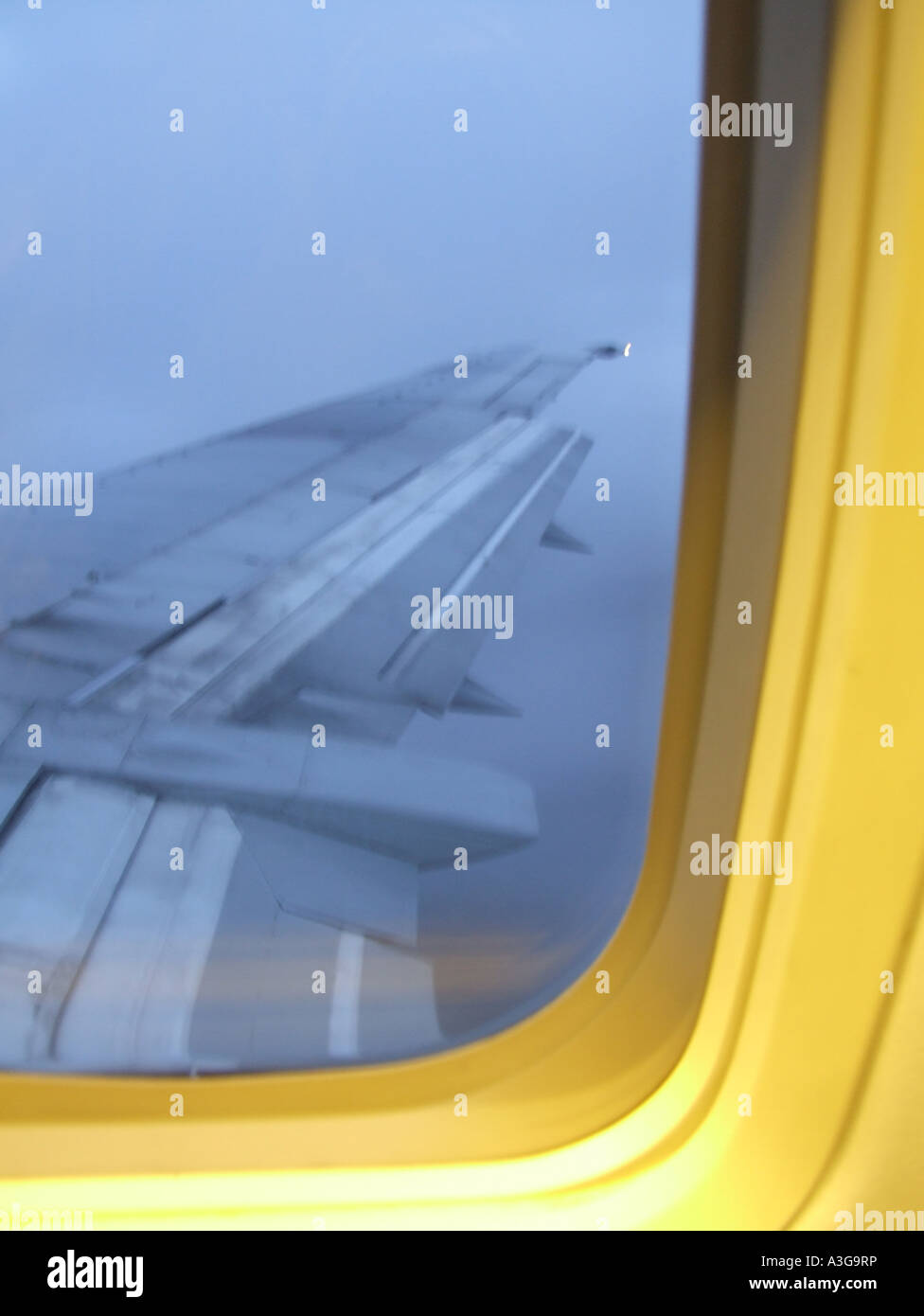 view of one old dirty plane wing from passenger window Stock Photo - Alamy