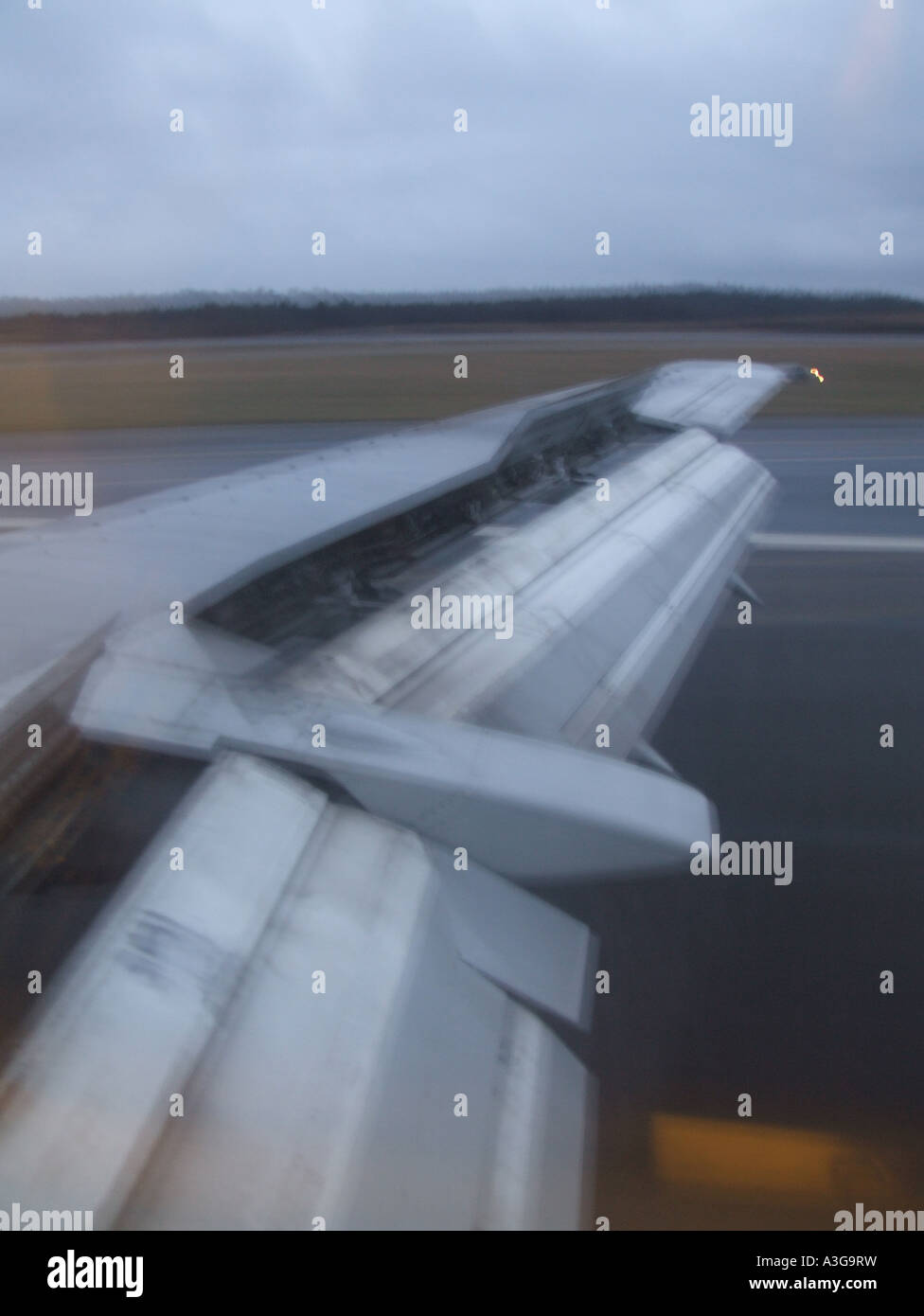 view of one old dirty plane wing from passenger window Stock Photo - Alamy
