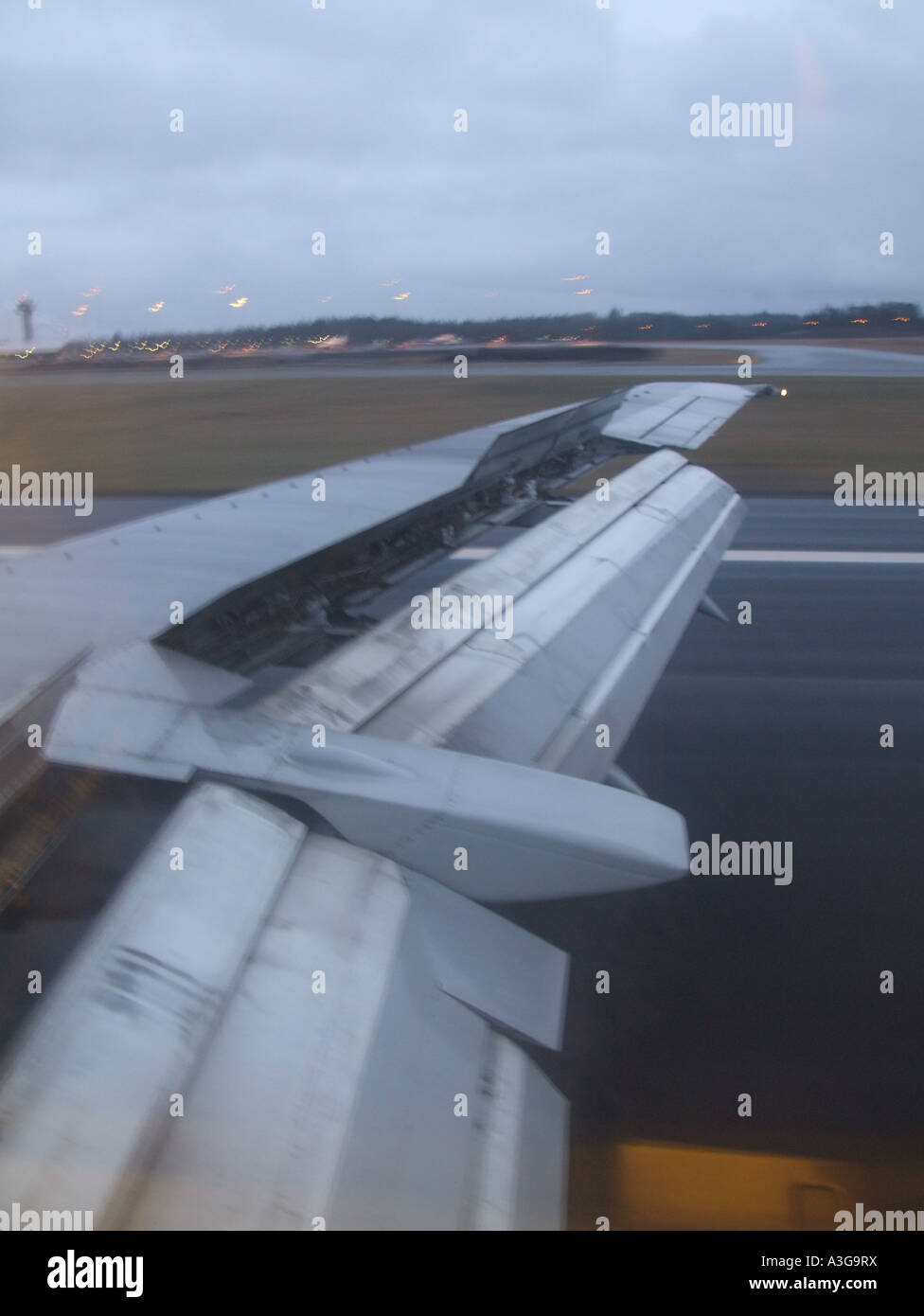 view of one old dirty plane wing from passenger window Stock Photo - Alamy