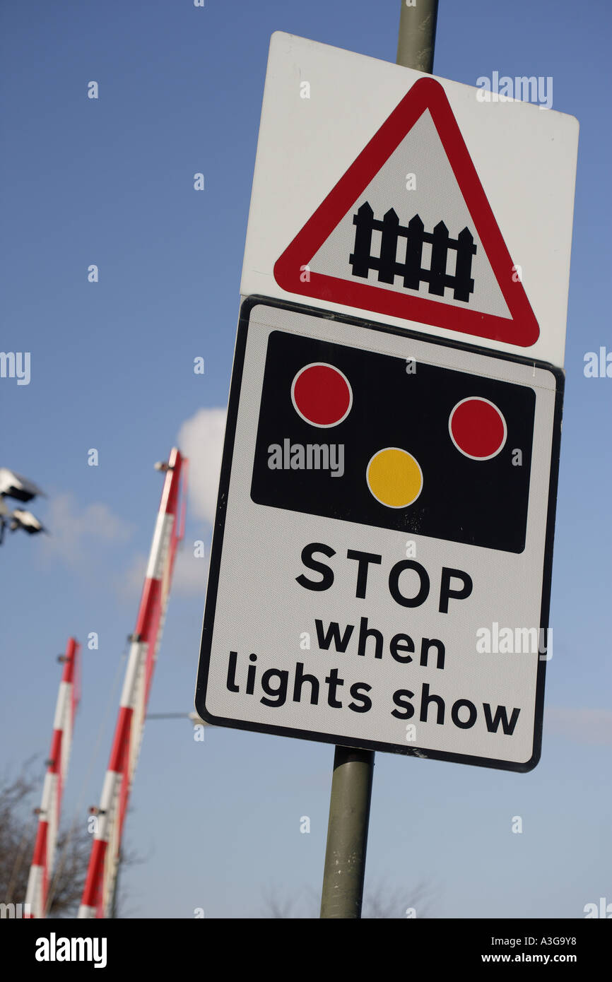 Level crossing Rail and road intersection Barriers close road when ...