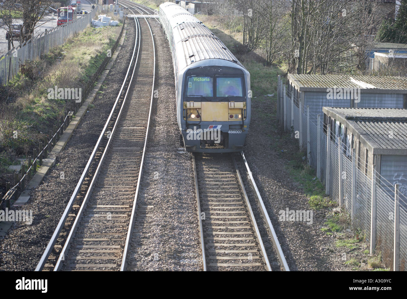 Local suburban train travelling along the line London England UK Stock ...