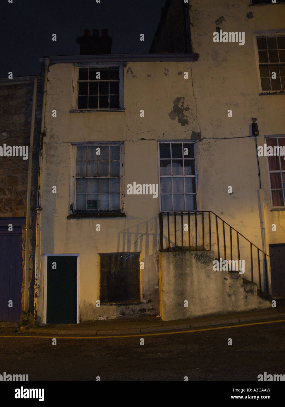 old derelict type building at night Stock Photo - Alamy
