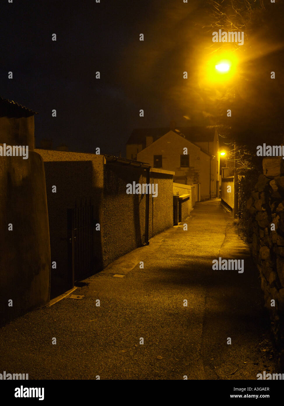 dark back alley way in residential area at night Stock Photo - Alamy