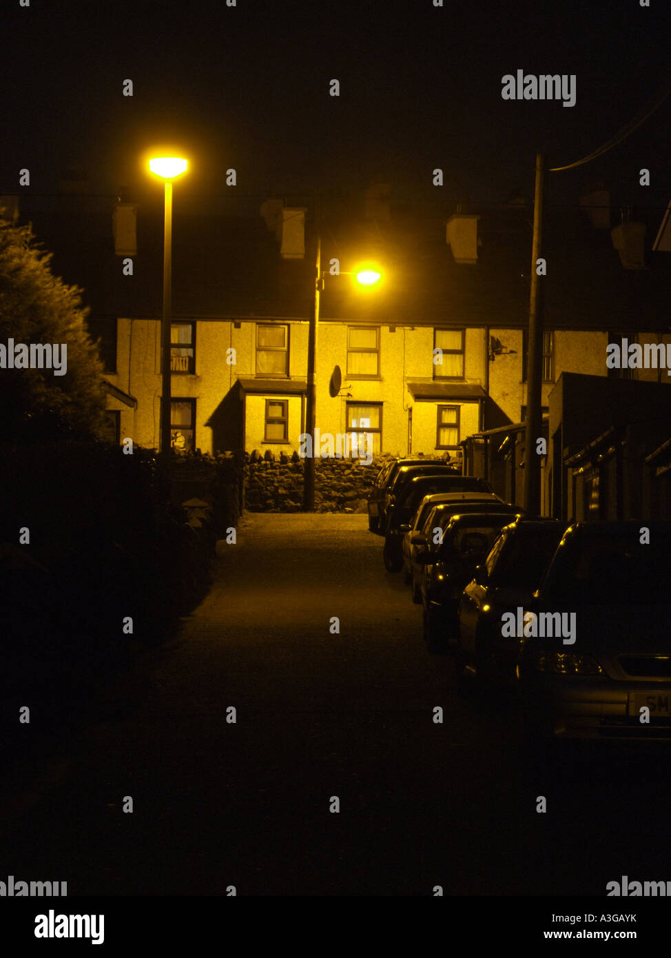 car parked outside house night Stock Photo - Alamy