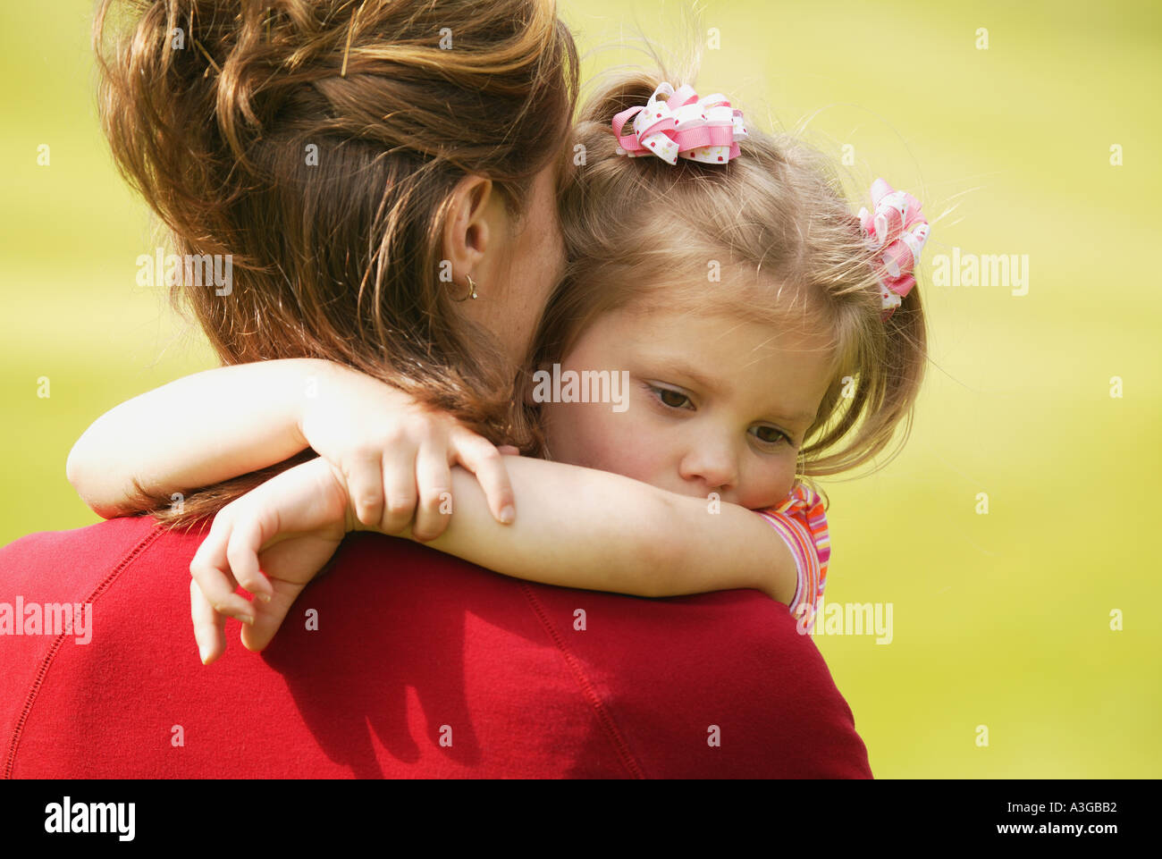 Parents consoling sad child hi-res stock photography and images - Alamy