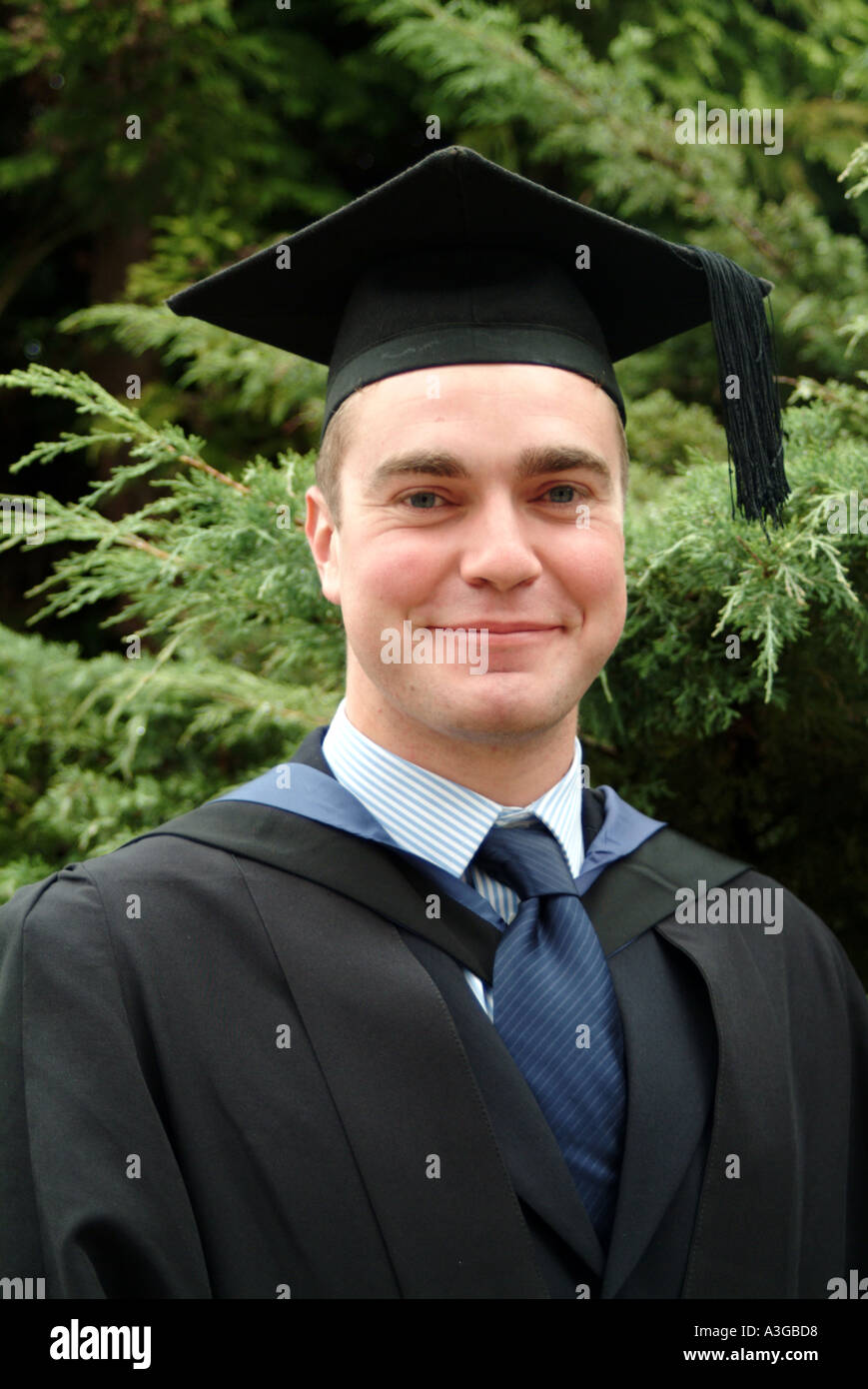 Freshly graduated young man Stock Photo - Alamy