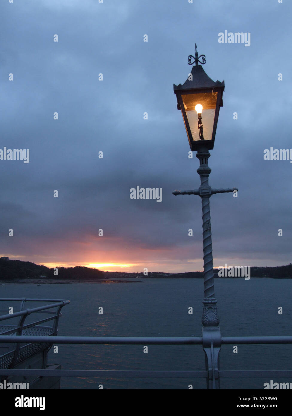 one old damaged street lamp at night by sea Stock Photo - Alamy