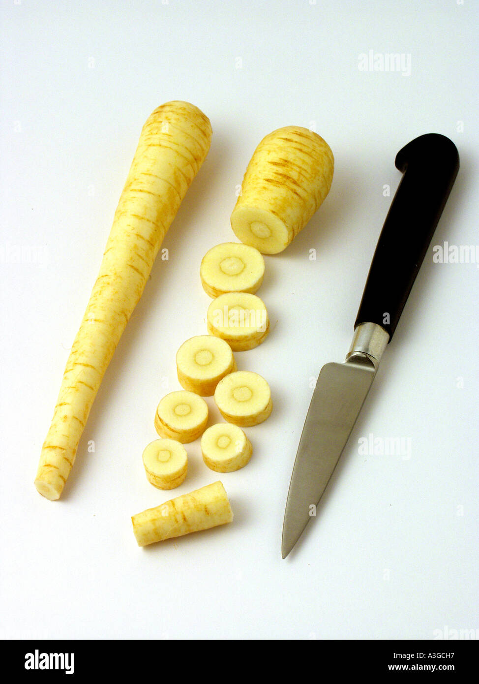 Fresh parsnips on cutting hi-res stock photography and images - Alamy