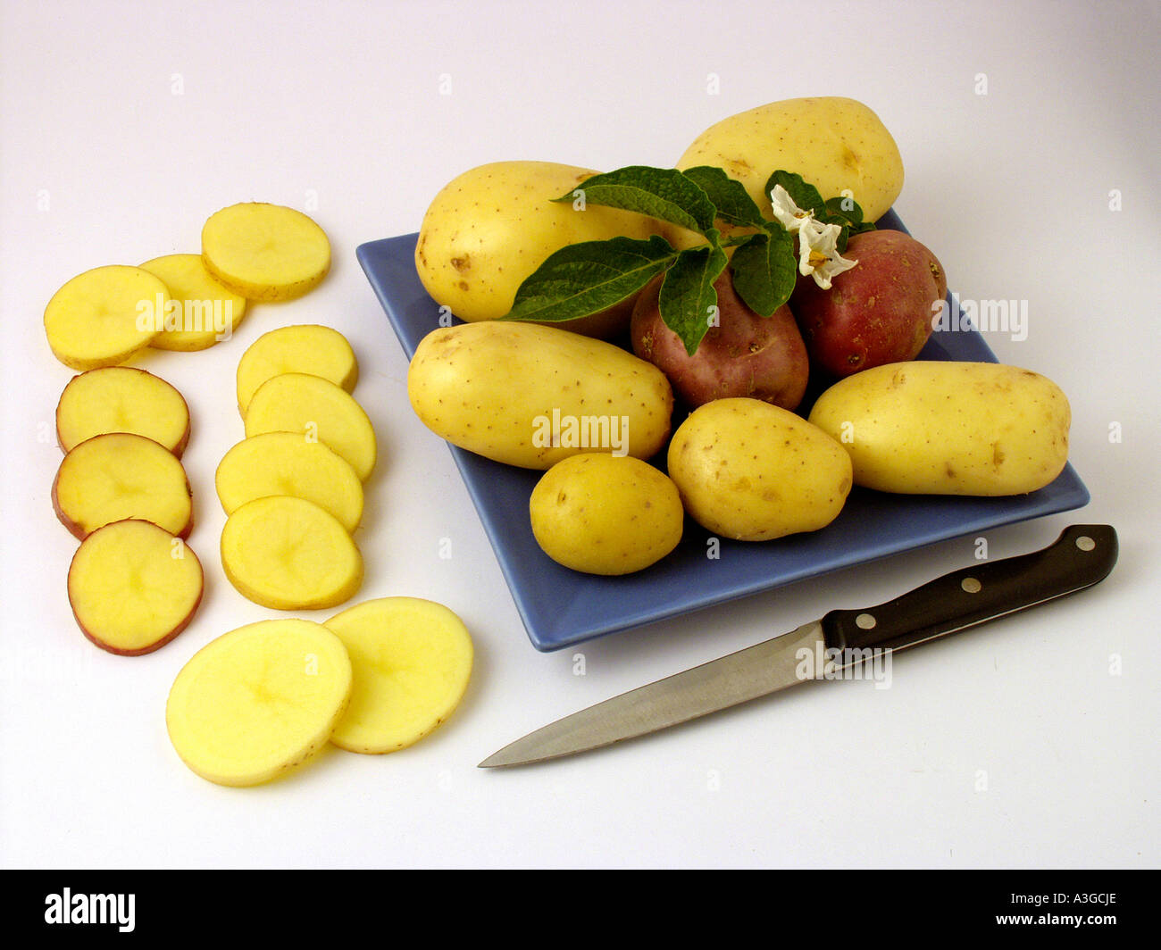 Cutting potatoes Cut Out Stock Images & Pictures - Alamy