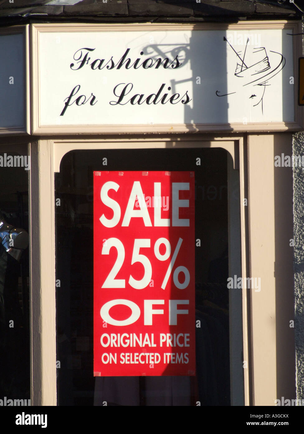 sales in shop window Stock Photo - Alamy