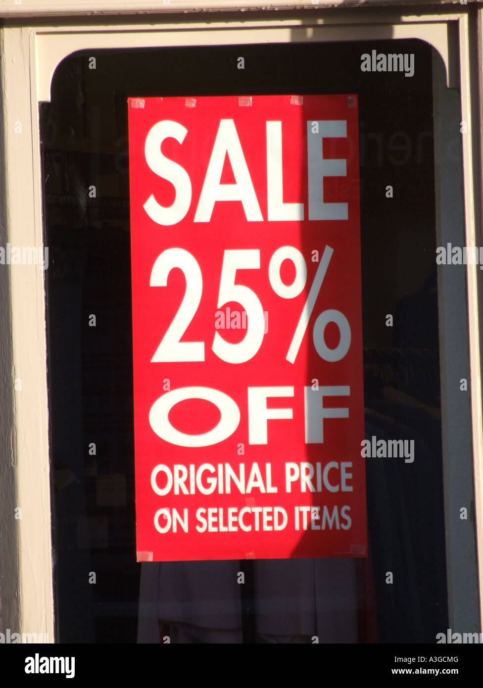 sales in shop window Stock Photo - Alamy