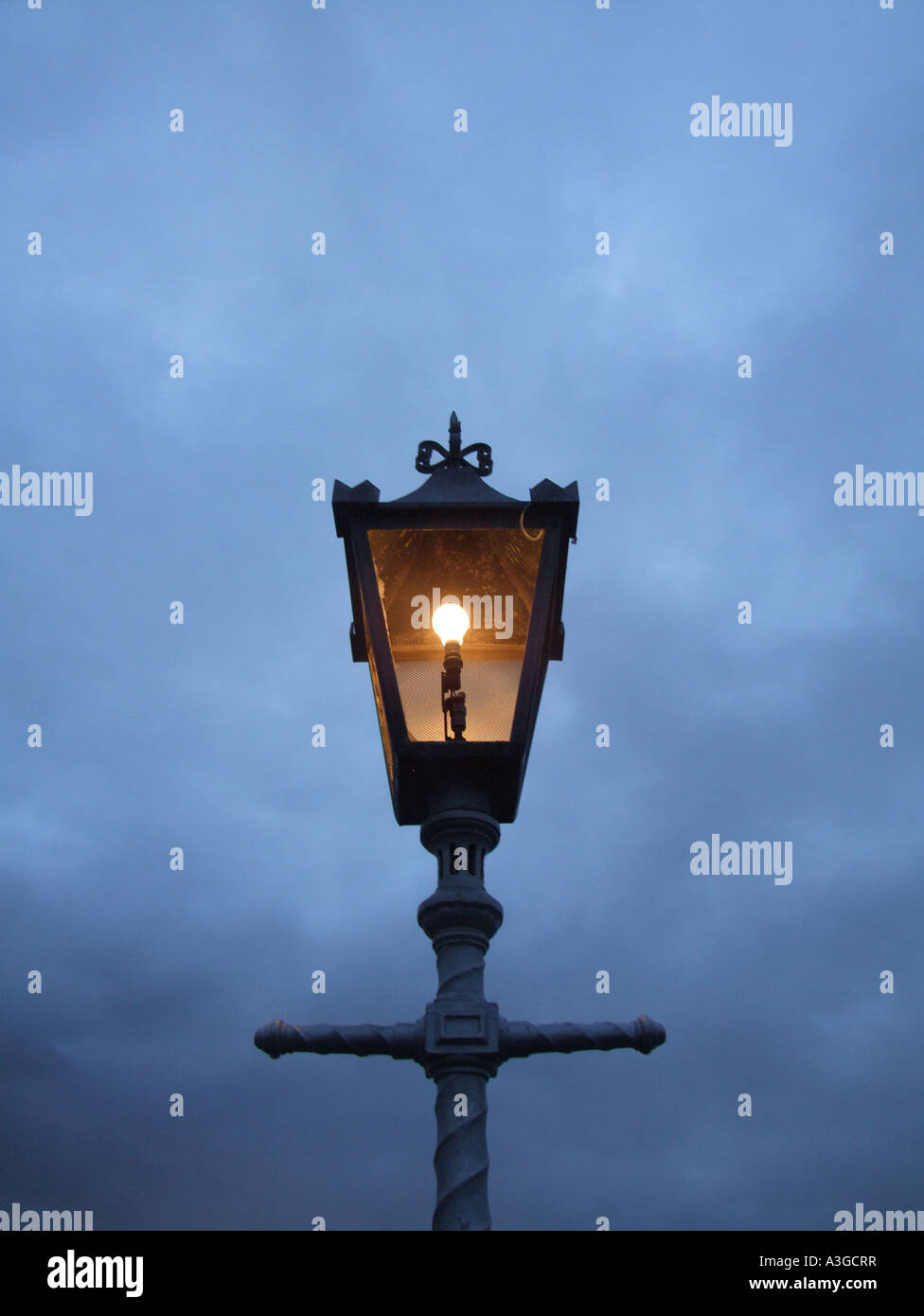 one old damaged street lamp at night by sea Stock Photo - Alamy