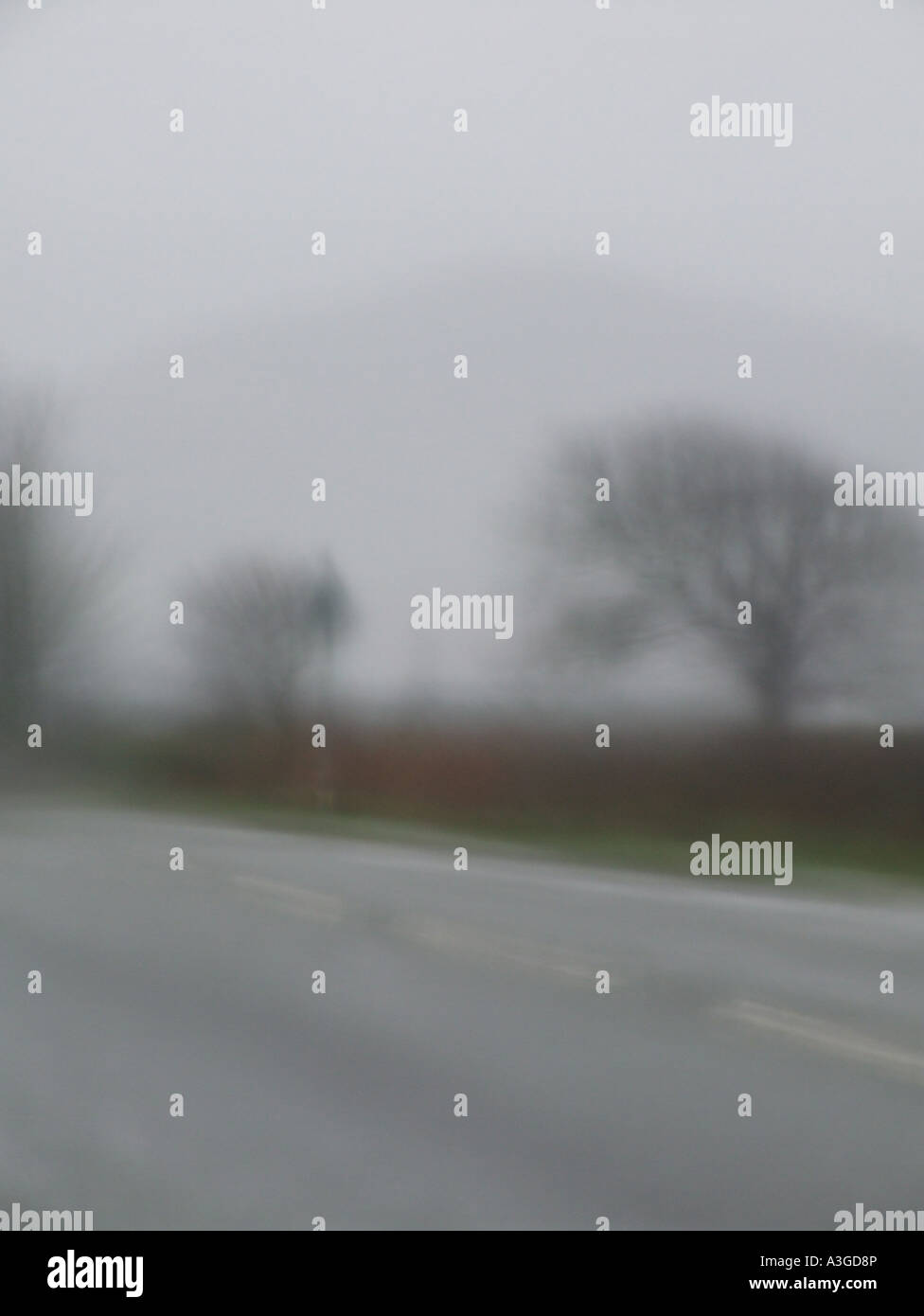 rural street in rain in countryside Stock Photo - Alamy