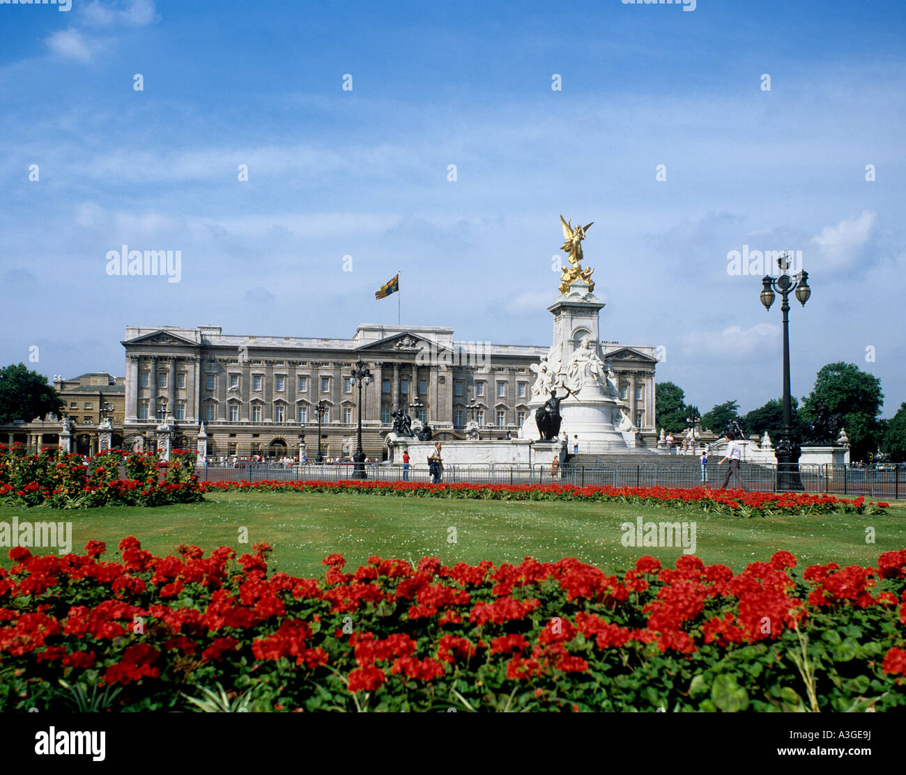 Buckingham Palace with the Royal Standard flying indication the The ...