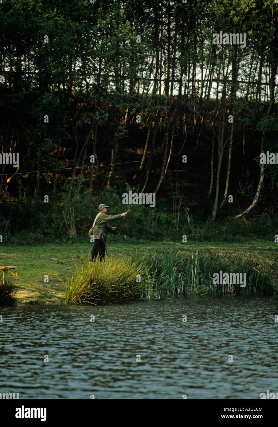 gentleman fly fishing on Hampstead ponds North London Stock Photo - Alamy