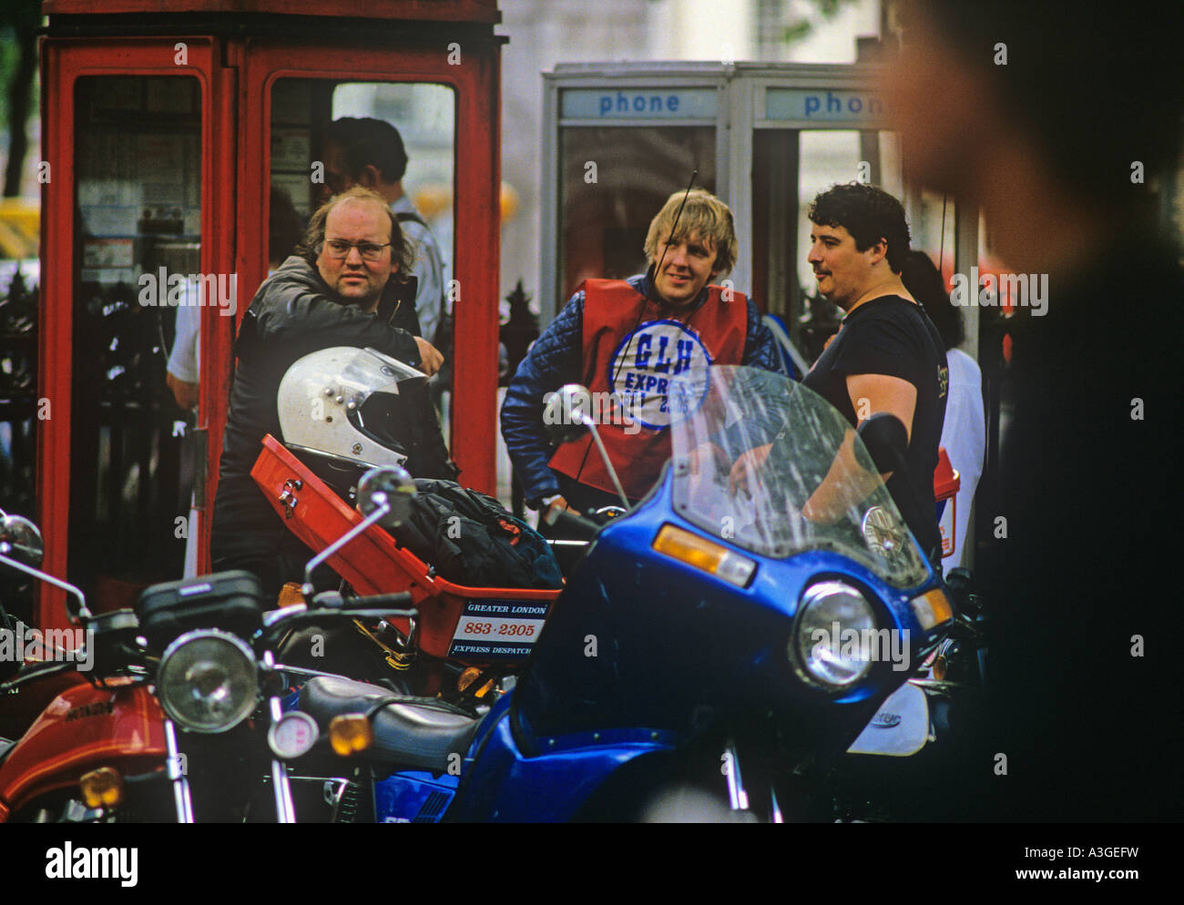 Motorcycle despatch riders waiting off the Charing Cross Road in ...
