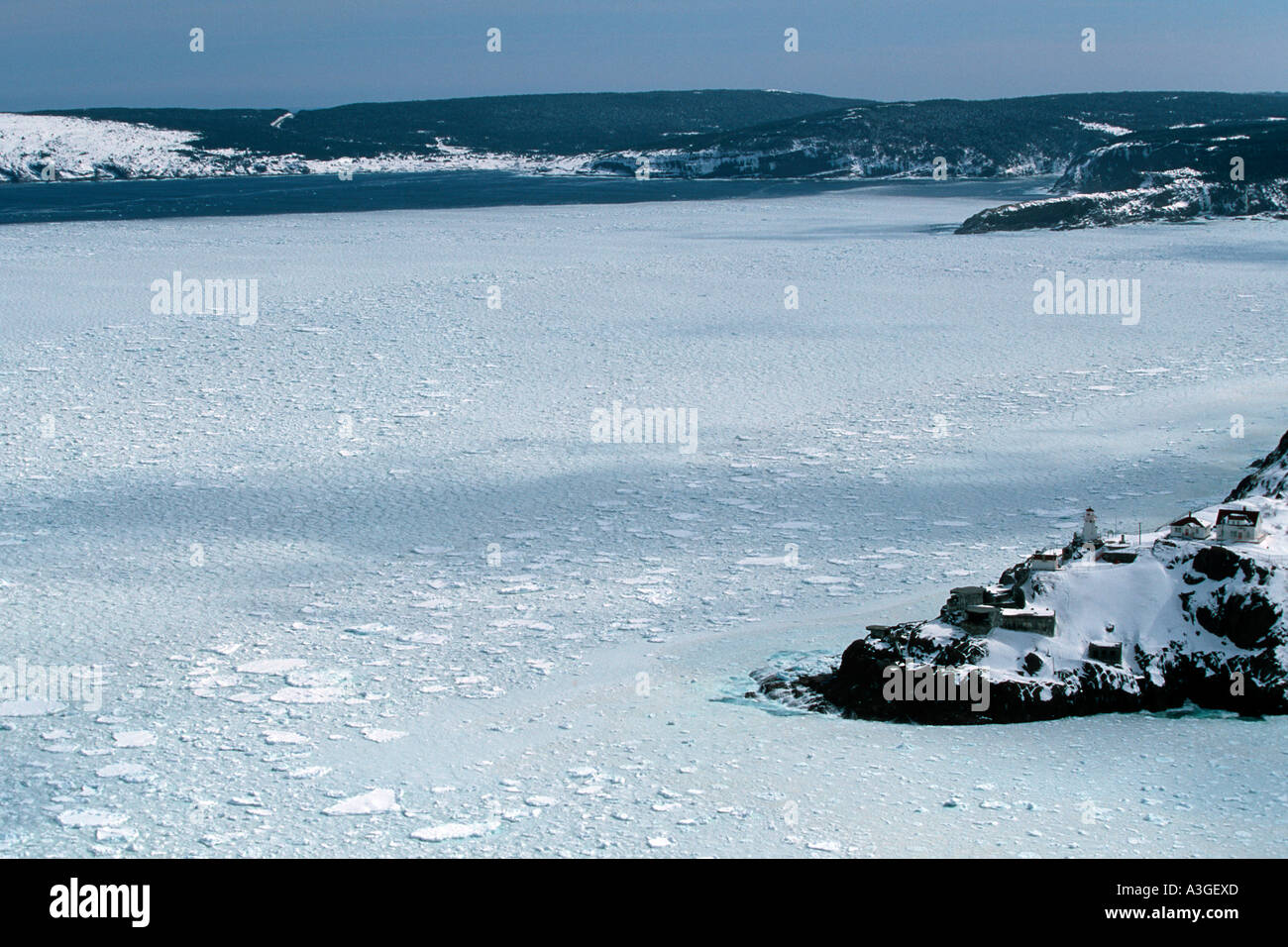 View from Signal Hill overlooking Fort Amherst Lighthouse surrounded by ...