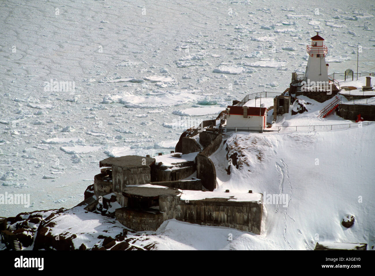 View from Signal Hill overlooking Fort Amherst Lighthouse surrounded by ...