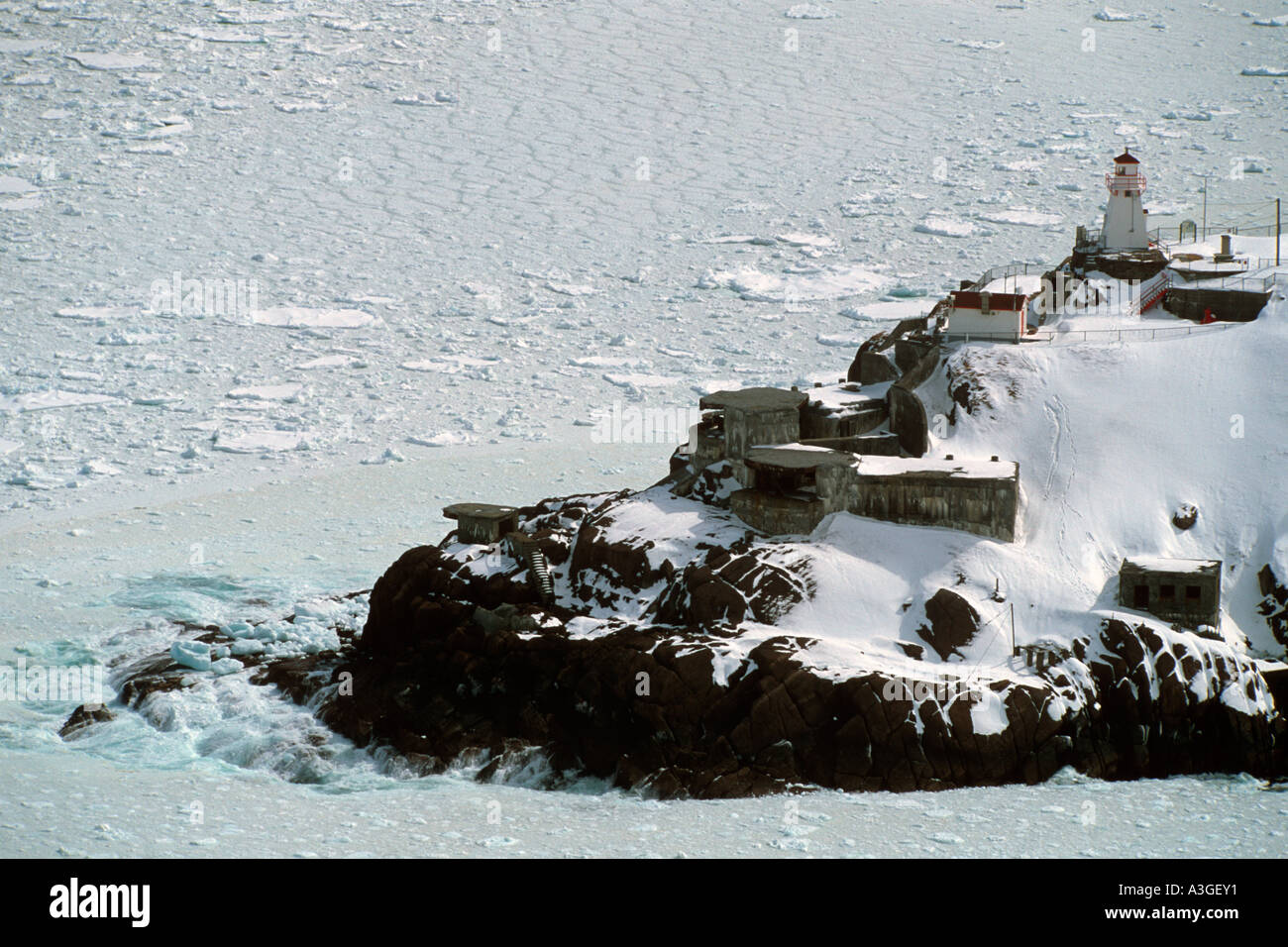 View from Signal Hill overlooking Fort Amherst Lighthouse surrounded by ...