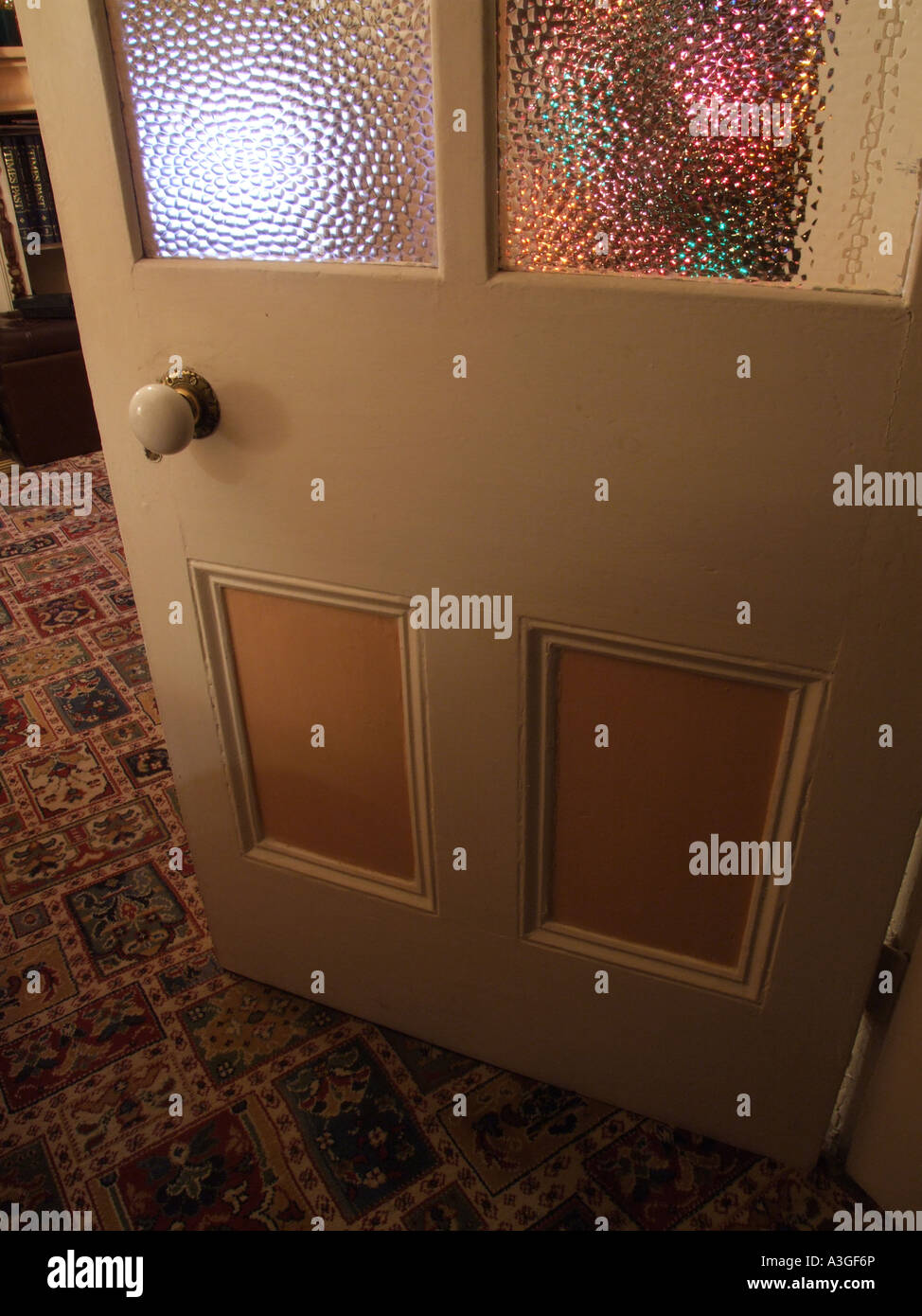 christmas tree lights through glass window door Stock Photo - Alamy