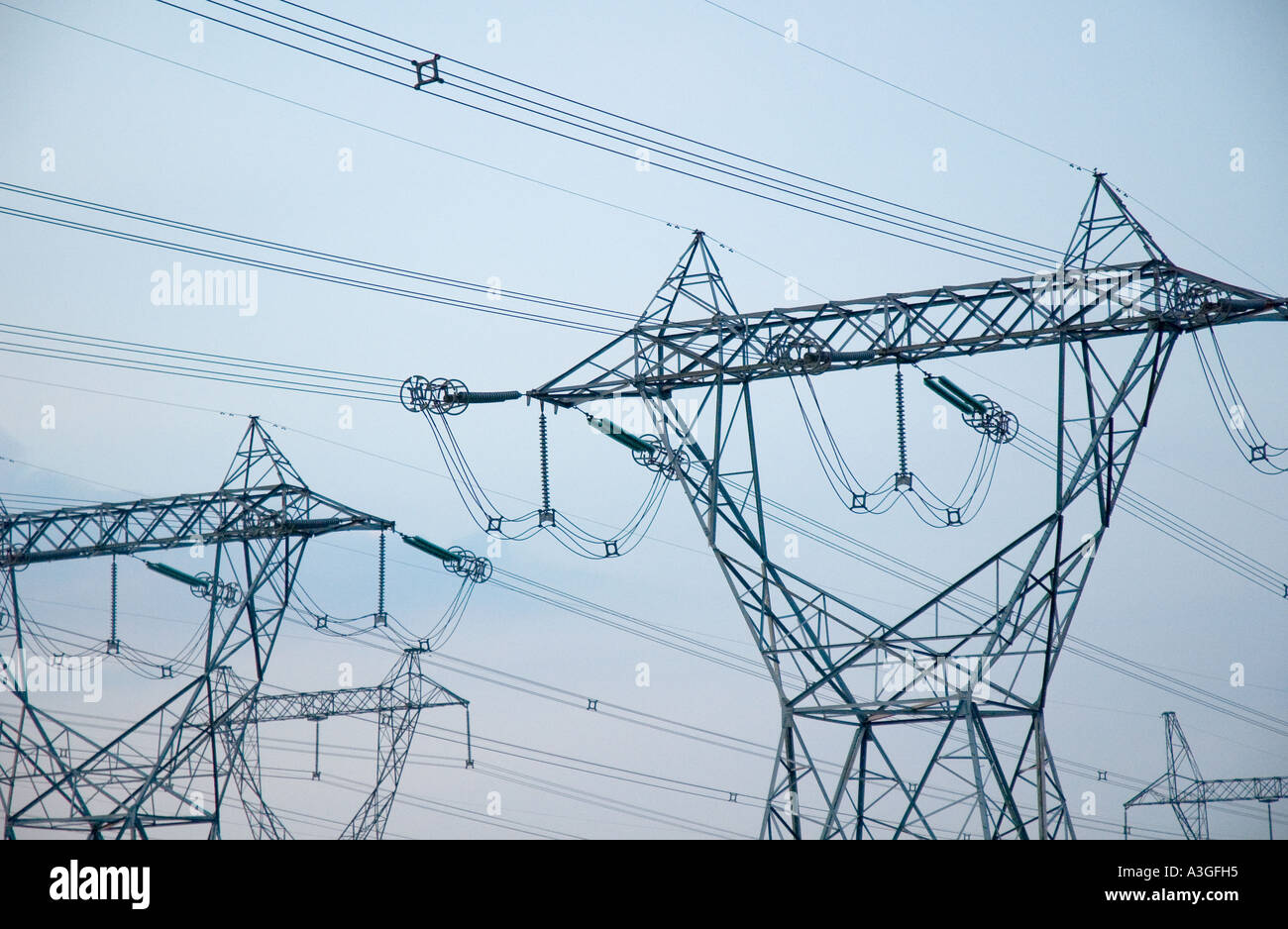 Electric power pilons Stock Photo - Alamy