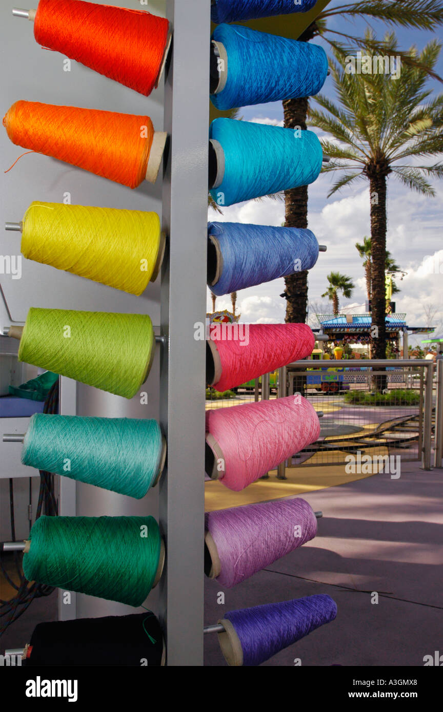 Colorful spools of thread on display Stock Photo - Alamy
